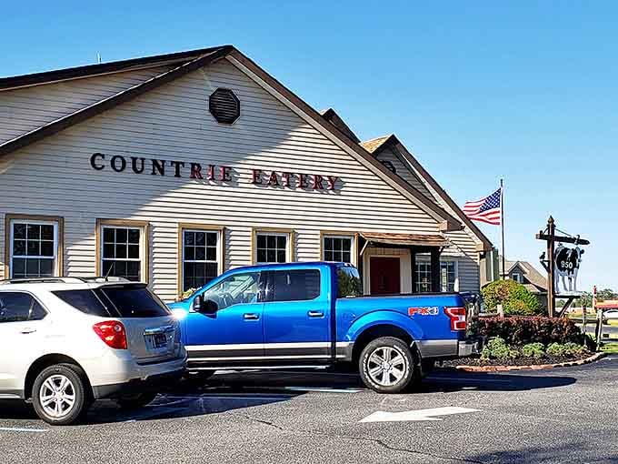 The Countrie Eatery's charming farmhouse exterior and American flag say "come on in" before you even park the car.