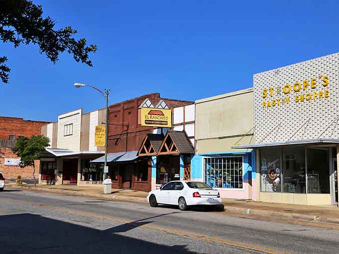 The vibrant blues and reds of Camden's storefronts pop against the clear Arkansas sky&mdash;small-town America in technicolor.