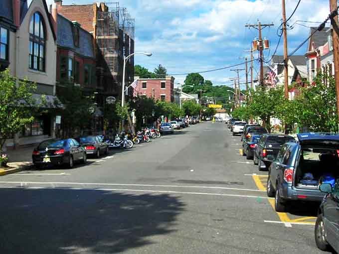 Historic buildings line Clinton's peaceful streets where motorcycles and cars share space in this charming riverside New Jersey community.