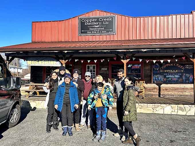 At Copper Creek Distillery, mountain tradition meets modern craft spirits. The rustic red exterior promises authenticity you can actually taste.