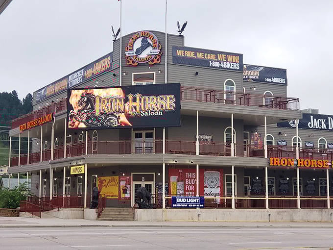 The Iron Horse Saloon isn't just a bar—it's a three-story temple to the motorcycle gods where stories get taller with each floor you climb.