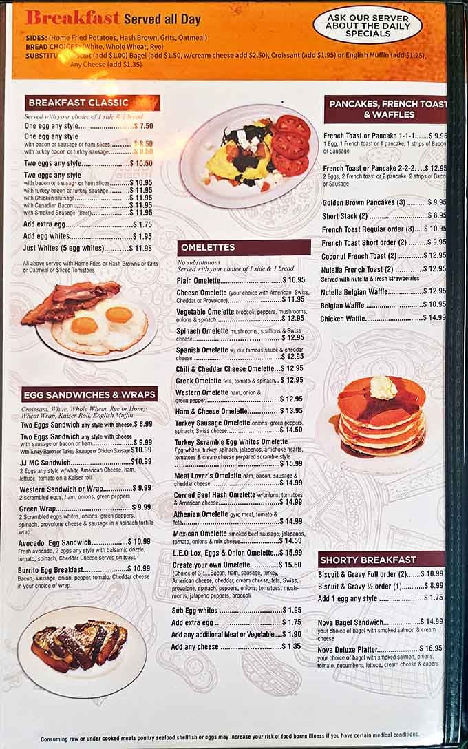 The breakfast menu at JJ Cafe reads like a love letter to morning comfort food. No pretension, just possibilities.
