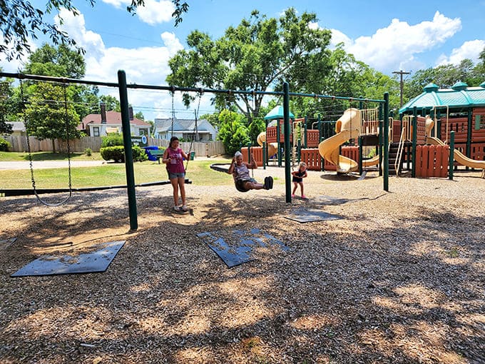 Simple childhood joys still exist at Murphree Park, where swings and slides create memories that outlast any video game achievement.
