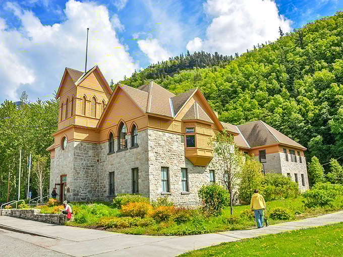 This isn't your average stone building &ndash; it's McCabe College, now home to Skagway Museum, where Gold Rush history meets architectural elegance at the foot of green mountains.