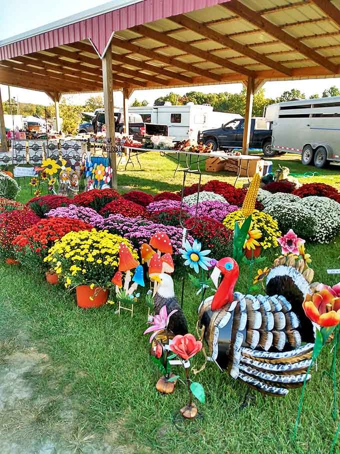 Fall's bounty explodes in vibrant mums and whimsical garden art. Mother Nature and Midwestern creativity collaborate on this colorful display that would make Martha Stewart swoon.