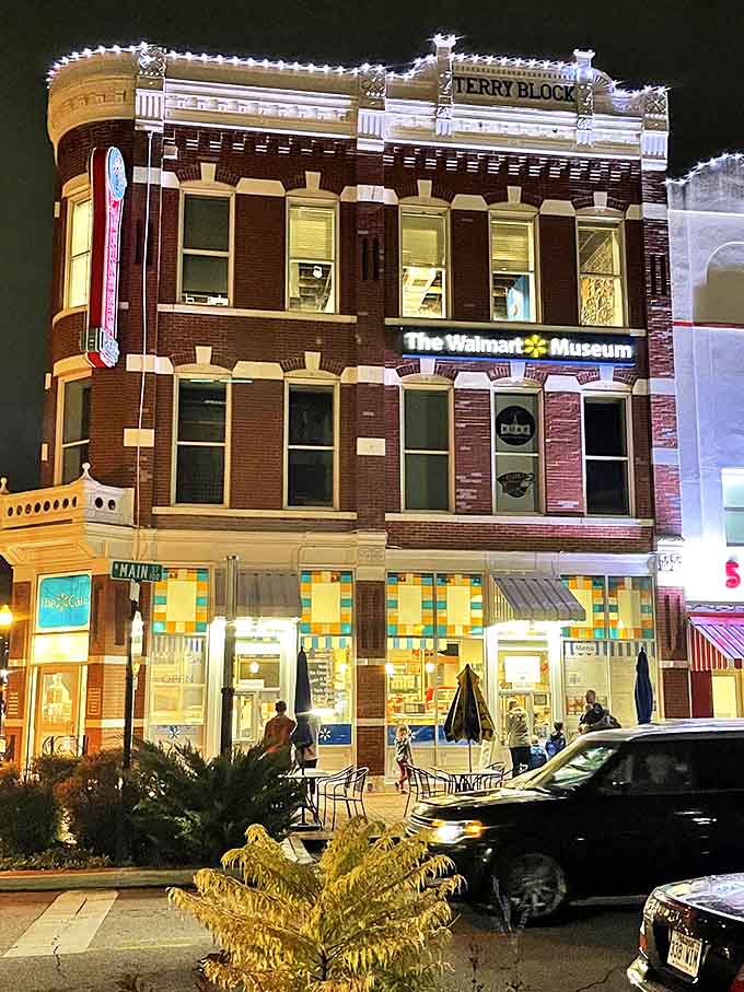 The Walmart Museum illuminates the night with history and nostalgia, housed in the Terry Block building where a retail revolution began.
