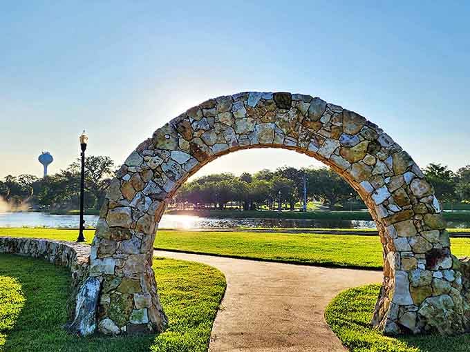 Step through Tuscawilla Art Park's stone arch and enter a world where nature and creativity dance together under Florida's brilliant blue skies.