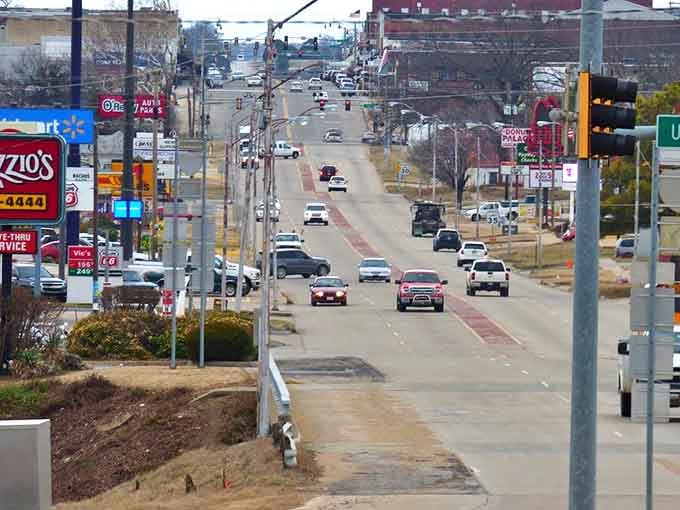 The commercial corridor stretches toward the horizon, a reminder that small towns balance modern convenience with old-fashioned community values.
