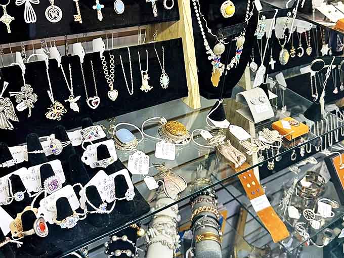 Silver and sparkle catch the eye at this jewelry display, where yesterday's accessories wait for their second act on new wrists and necklines.