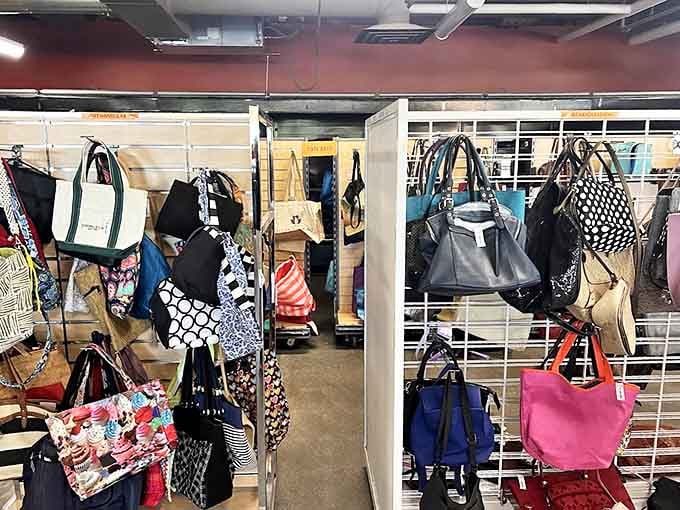 Handbag heaven! Designer lookalikes and vintage classics hang like fashionable fruit ripe for the picking.