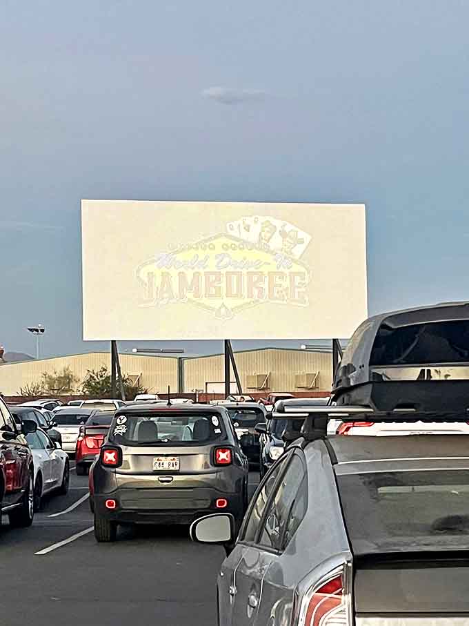 The "Jamboree" sign glows with vintage charm as cars line up for showtime. Some traditions deserve preservation, especially at $8.75 a pop.