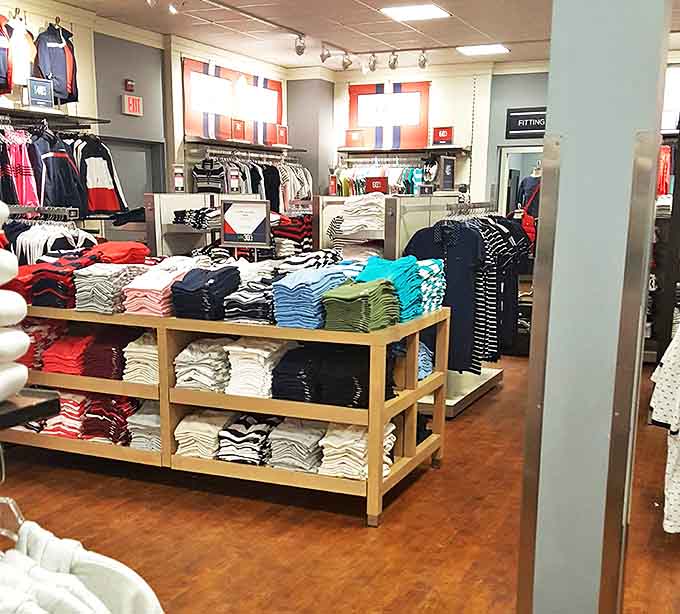 The holy grail of wardrobe refreshment: neatly folded stacks in every color of the rainbow, arranged with the precision of a retail symphony.