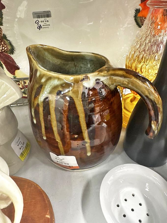 Someone's former kitchen treasure awaits its second act. This glazed pitcher has stories to tell &ndash; possibly involving punch at wilderness cabin gatherings.