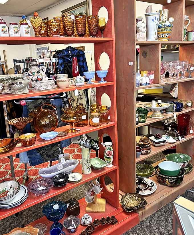 Amber glassware catches the light like liquid honey, while vintage ceramics stand ready to grace new dining tables with stories of dinners past.