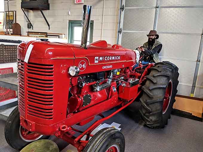 This gleaming McCormick tractor isn't just farm equipment—it's agricultural royalty. The kind of mechanical marvel that makes grown men whisper, "They don't make 'em like this anymore."