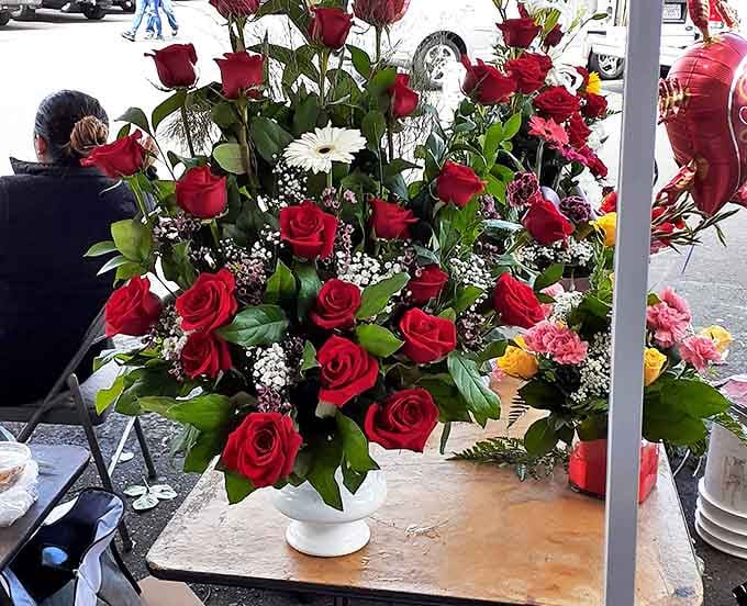 Fresh roses that could make even the most hardened bargain hunter pause for a moment of unexpected beauty amid the treasure hunting.