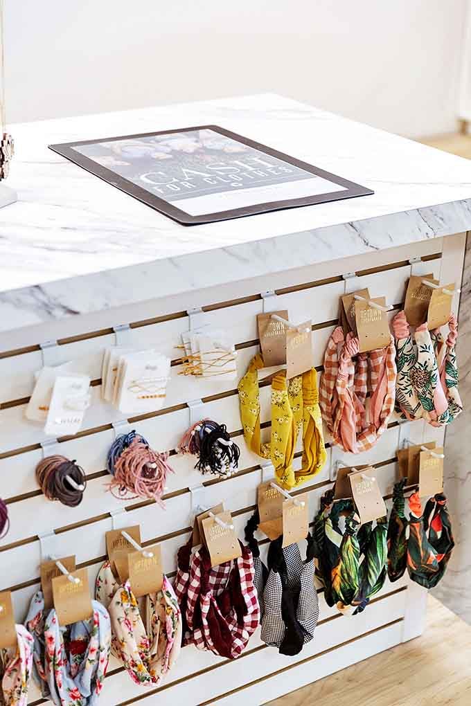 A rainbow of scarves and hair accessories awaits &ndash; proof that sometimes the smallest fashion statements make the biggest impact.