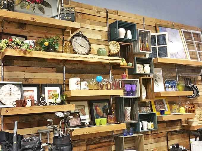 This rustic pallet wall display transforms ordinary home goods into an Instagram-worthy collection that would make Joanna Gaines swoon.
