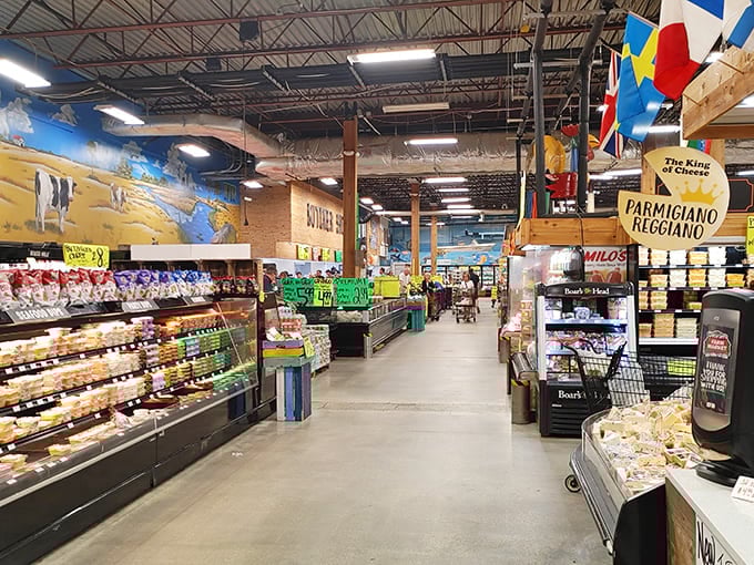 Aisles wide enough for carts to pass without the awkward shopping cart tango. Note the "King of Cheese" sign—a title well earned.