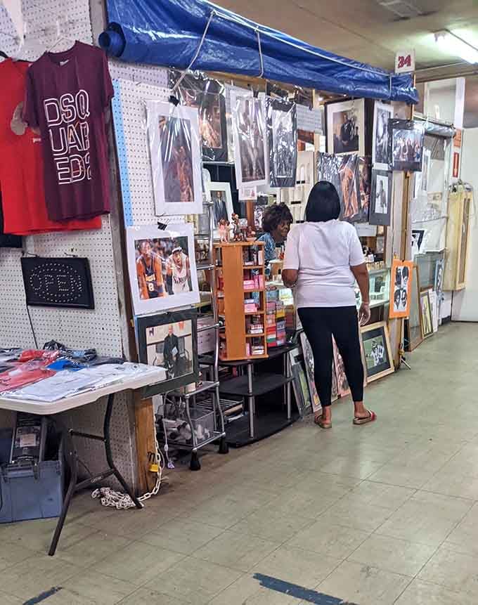 Every stall tells a story. This vendor's carefully arranged display of memorabilia and apparel is someone's nostalgia goldmine waiting to be discovered.