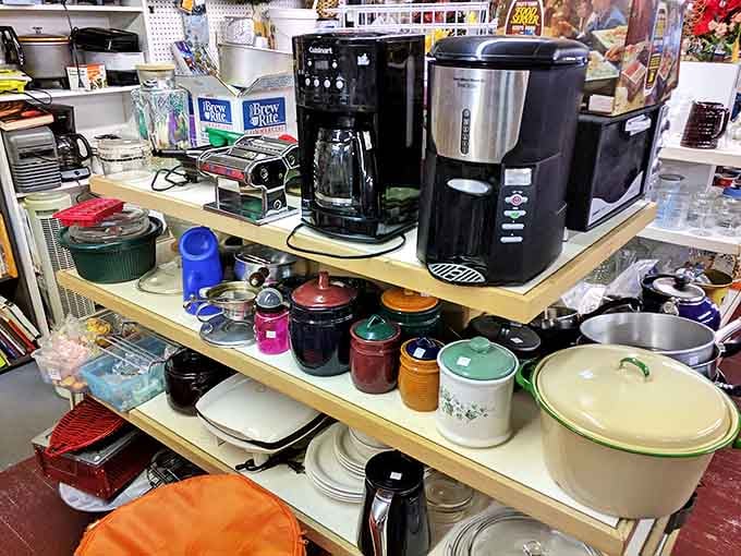 Coffee makers, colorful canisters, and vintage Pyrex await new homes&mdash;kitchen treasures that whisper stories of family dinners past.
