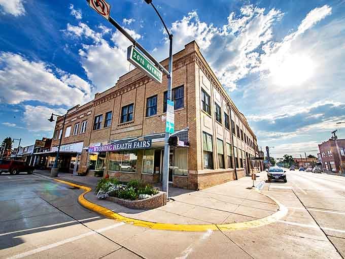 The corner of 20th Avenue showcases Torrington's blend of historic architecture and blue Wyoming skies. Those clouds look like they were painted by Bob Ross himself.
