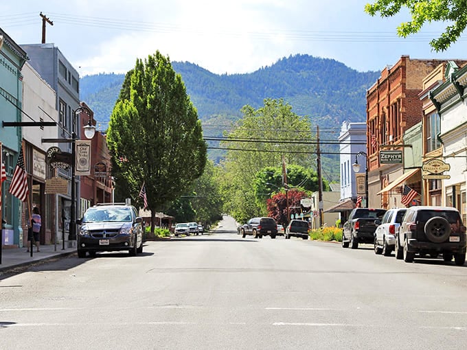Main Street unfolds like a time capsule with the Franco American Hotel's vibrant red brick standing proud against Yreka's impossibly blue skies.