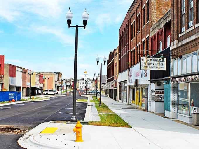 A glimpse down Main Street toward the courthouse, where lamp posts stand taller than your monthly utility bills.