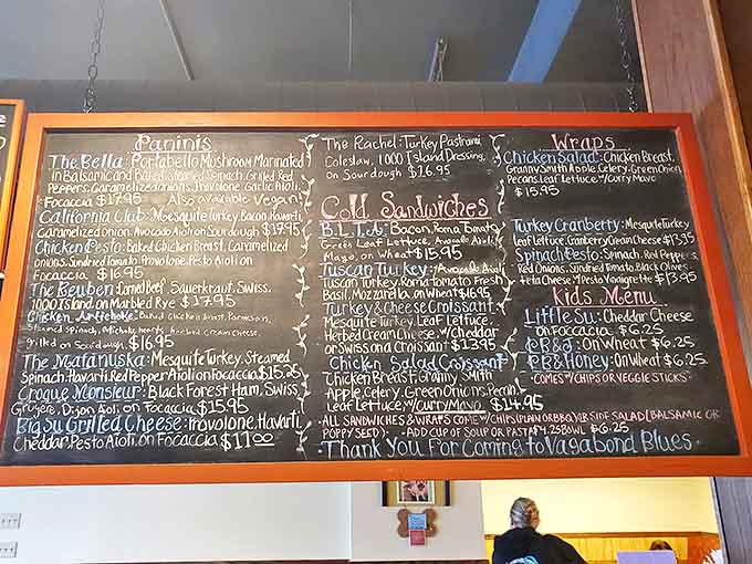 This menu board isn't just a list—it's a roadmap to happiness. Each handwritten item represents a culinary journey worth taking, with destinations like "The Bella" and "The Rachel."