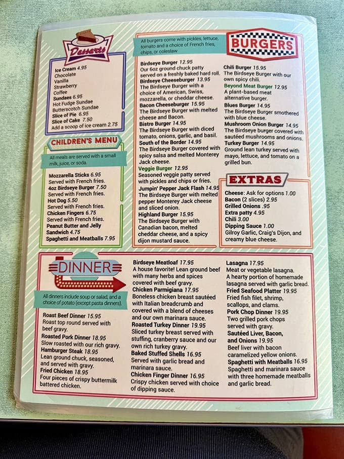 The menu&mdash;a laminated masterpiece of possibility. Study it like ancient scripture, for within these plastic-coated pages lies the path to comfort food nirvana.