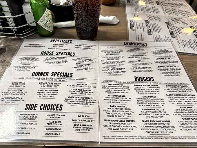 A menu so extensive it requires strategic planning. The laminated pages hold more possibilities than your weekend schedule.