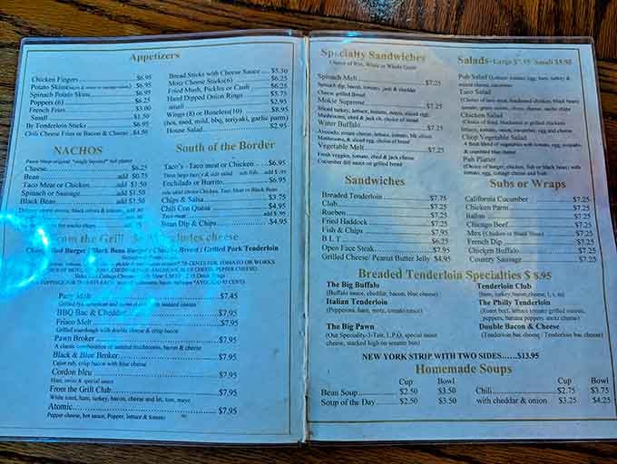 A menu that reads like a love letter to comfort food. No molecular gastronomy here, just honest dishes that understand what hunger really means.