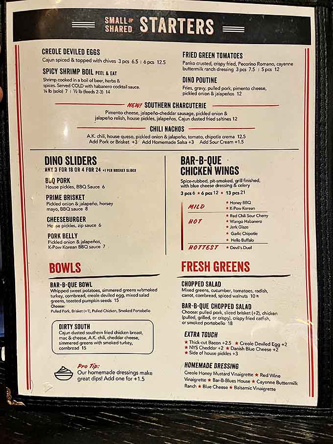 The menu reads like a love letter to Southern comfort, with "Dino Poutine" making a compelling argument for immediate ordering.