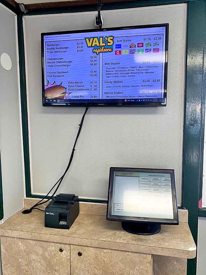 A menu board that belongs in the Smithsonian's "American Affordability" exhibit. When's the last time you saw a hamburger for $2.10 outside your dreams?