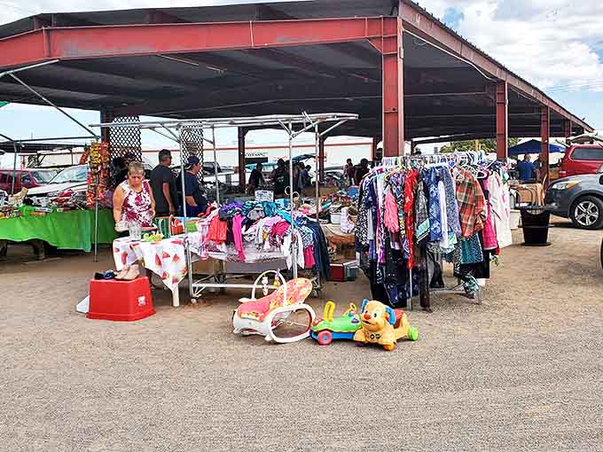 Under the red metal canopy, childhood memories and future garage sales mingle as shoppers hunt for that perfect something.