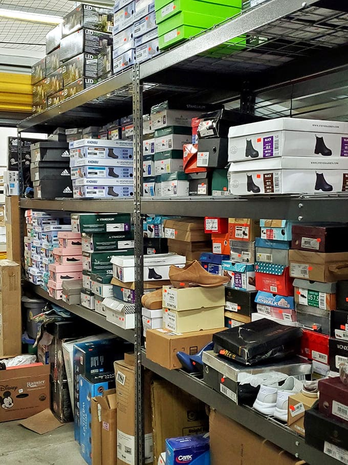 Shoe paradise or footwear museum? Brand names stack to the ceiling in this sneakerhead's dream, where your next favorite pair awaits discovery.