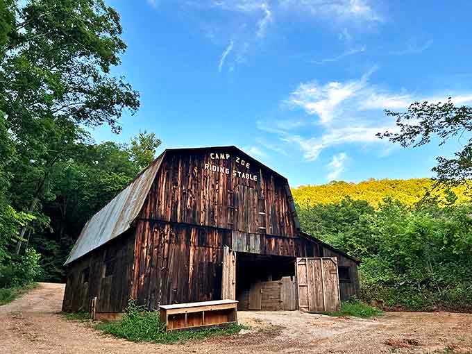 The historic Camp Zoe riding stable stands as a weathered sentinel of Ozark history, its rustic charm irresistible to photographers and nostalgics alike.