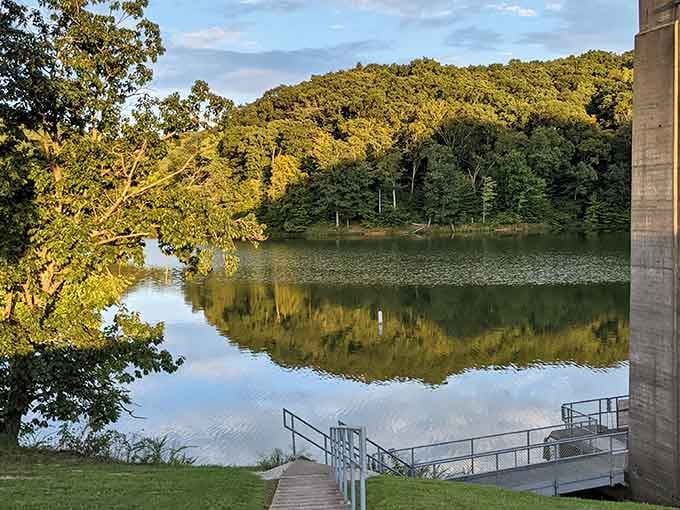 Golden hour transforms Burr Oak into a painter's dream, where trees dip their toes into waters that hold the sky captive.