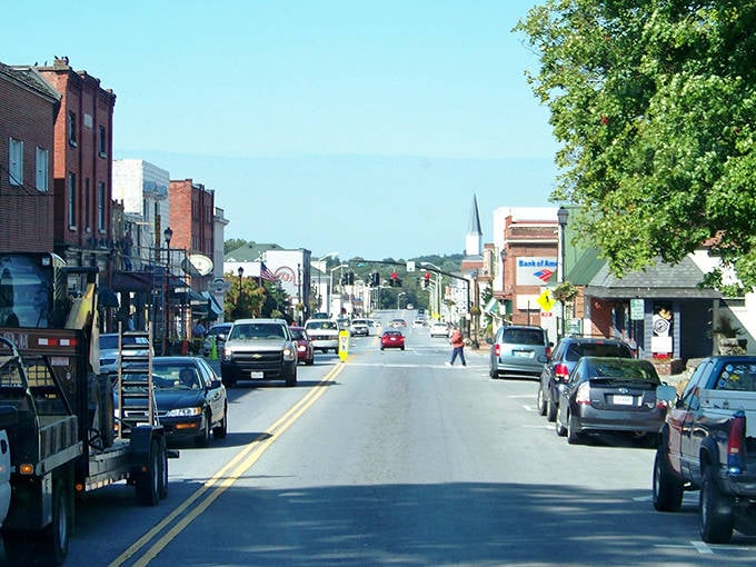 Mountain backdrop frames this charming downtown like Mother Nature decided to paint the perfect small-town portrait.