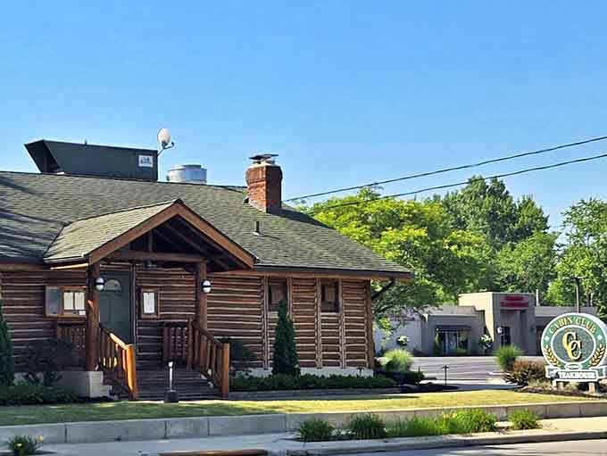 This log cabin exterior whispers "comfort food" &ndash; and their legendary steaks deliver on that rustic promise beautifully.