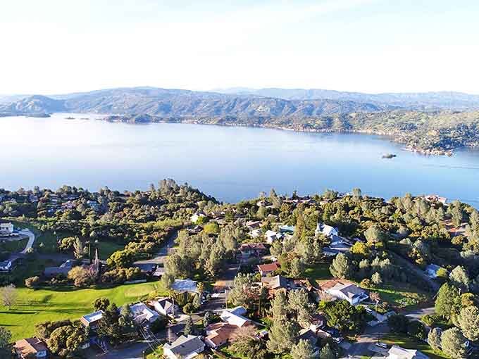 Aerial view of Clearlake nestled against the serene waters of Eagle Lake. Small-town charm with big nature views!