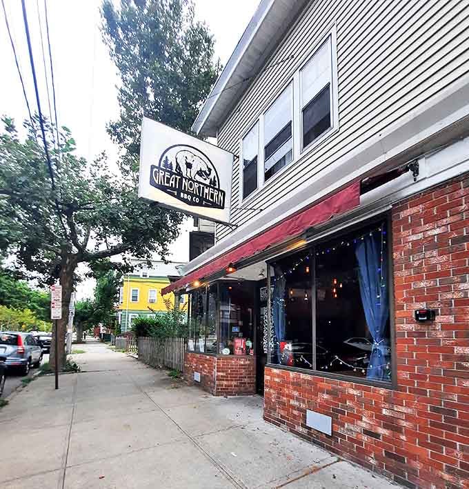 Brick, siding, and a simple sign—the universal code for "life-changing BBQ happens here." No reservations, just revelations.