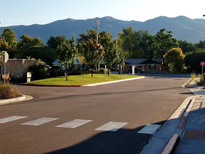 The mountains behind Layton neighborhoods aren't just scenery &ndash; they're daily reminders that nature's grandeur is part of the commute.