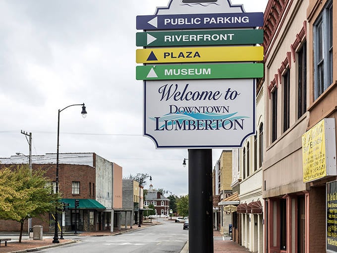 Welcome signs point the way to Lumberton's riverfront and plaza&mdash;proof that small towns know exactly what matters without any big-city fuss.