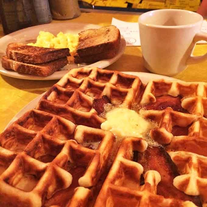 This golden waffle isn't just breakfast&mdash;it's architecture with butter. The perfect grid pattern creates little pools of melty goodness.