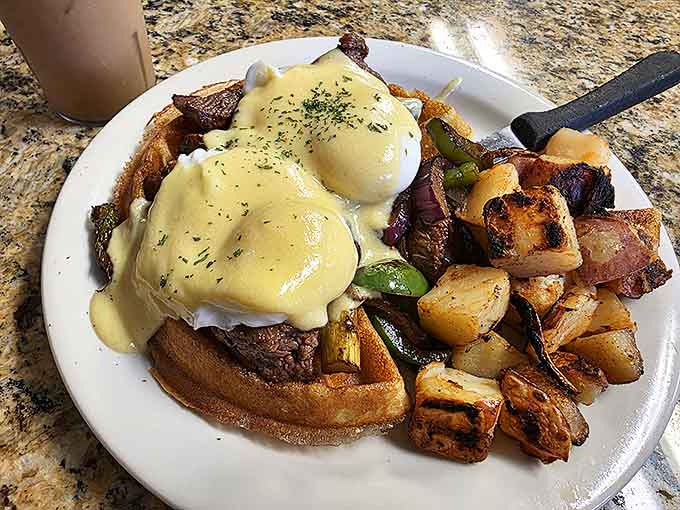Behold the Benedict in all its glory&mdash;poached eggs perched atop their throne, crowned with hollandaise that cascades like a golden waterfall. Those home fries deserve their own fan club.