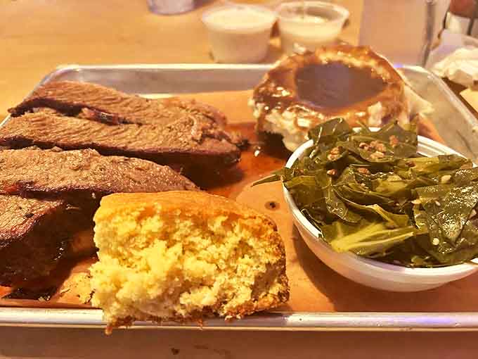 Brisket that doesn't need a filter. The smoke ring tells the truth, while that cornbread and collard greens provide the perfect supporting cast.