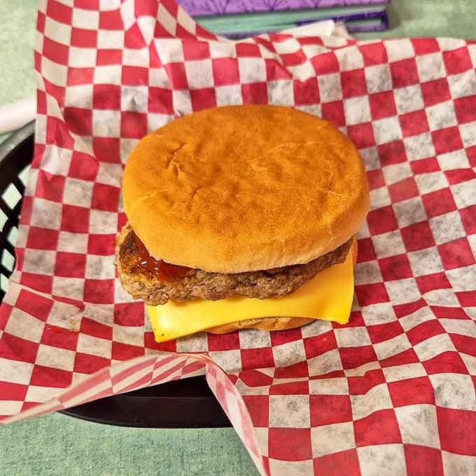 This isn't just a cheeseburger&mdash;it's edible Mississippi history. The doughburger tradition lives on, served on a classic red checkered paper that's practically part of the flavor.