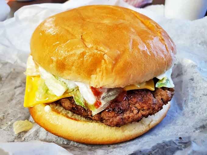 Behold the star of the show: a perfectly proportioned cheeseburger that makes you wonder why anyone bothers with those fancy $25 versions downtown.