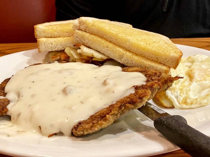 Behold the legendary chicken fried steak &ndash; a golden-brown masterpiece swimming in gravy that could make a vegetarian reconsider.